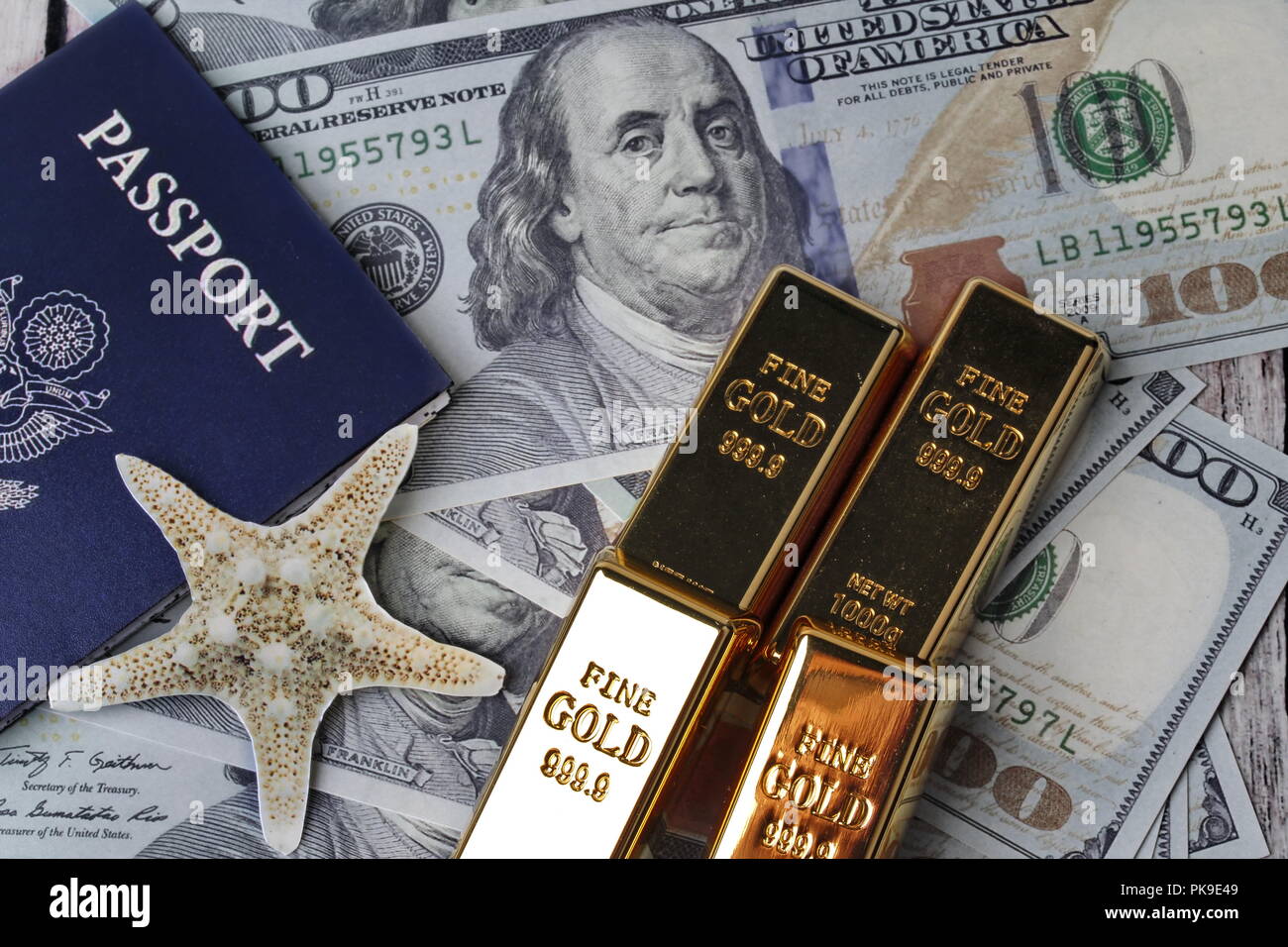 Gold bar,passport,bank note for the time of relaxation and tourism ...