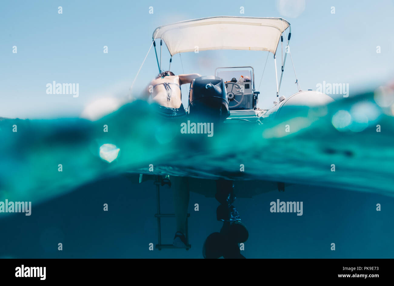 Underwater swimmer sea back view hi-res stock photography and images ...