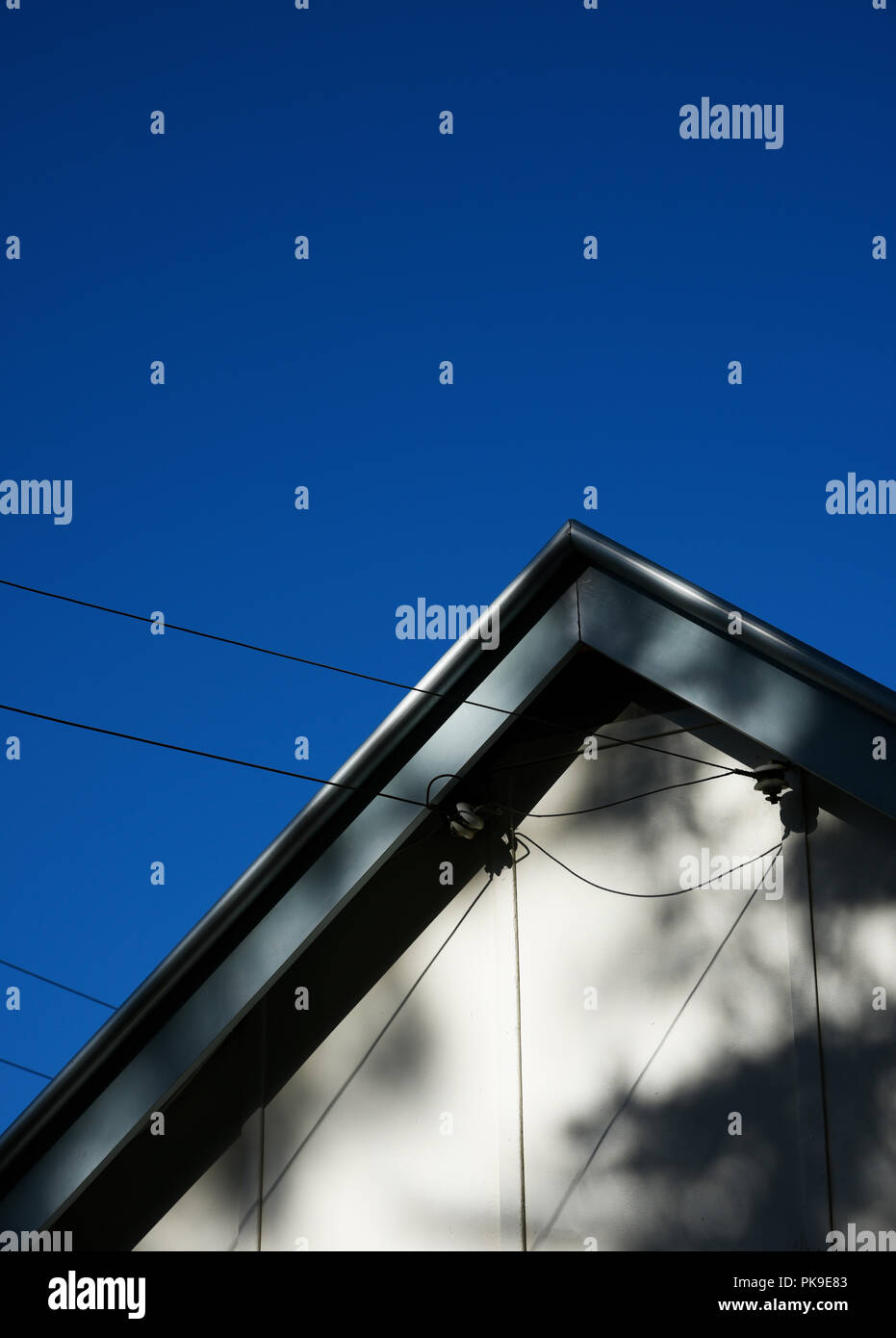 electricity power supply cables arriving at a small country house in ...