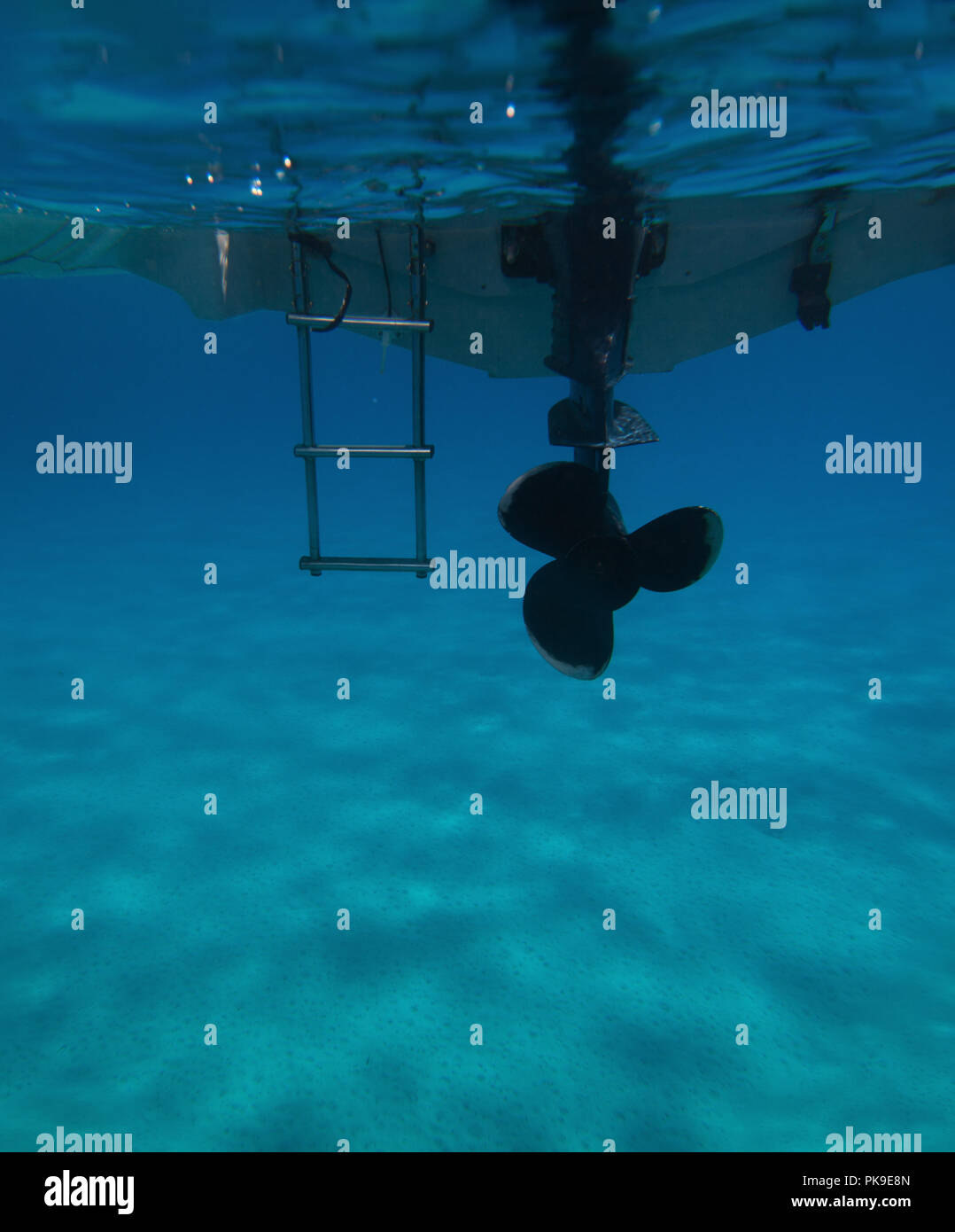 underwater back view of a little boat Stock Photo - Alamy