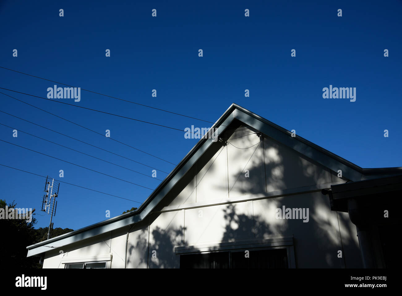 electricity power supply cables arriving at a small country house in ...