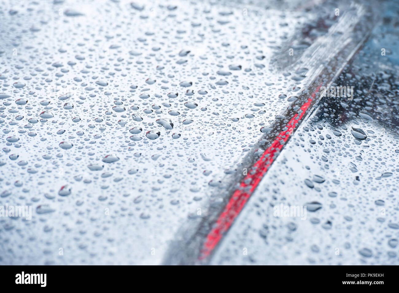 blue toned vehicle raindrop abstract Stock Photo - Alamy