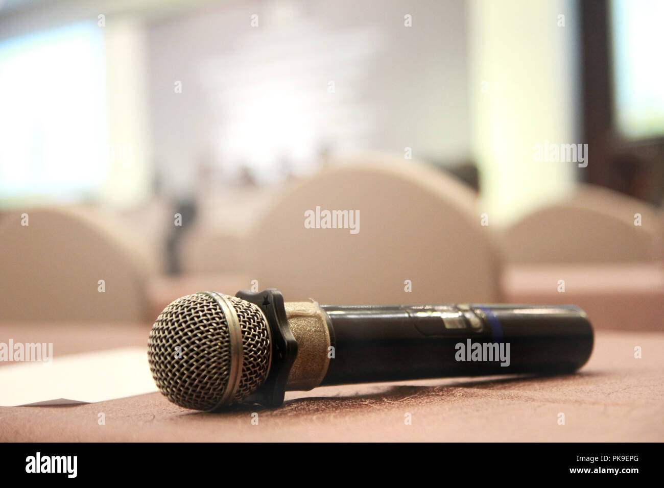 The microphone is located on prepared table at the center of the room ...