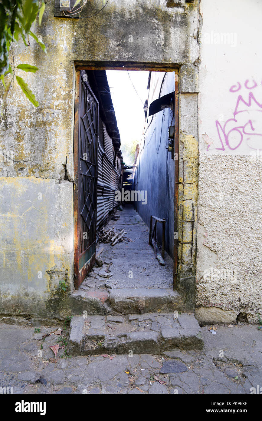 Narrow way street entrance Stock Photo - Alamy