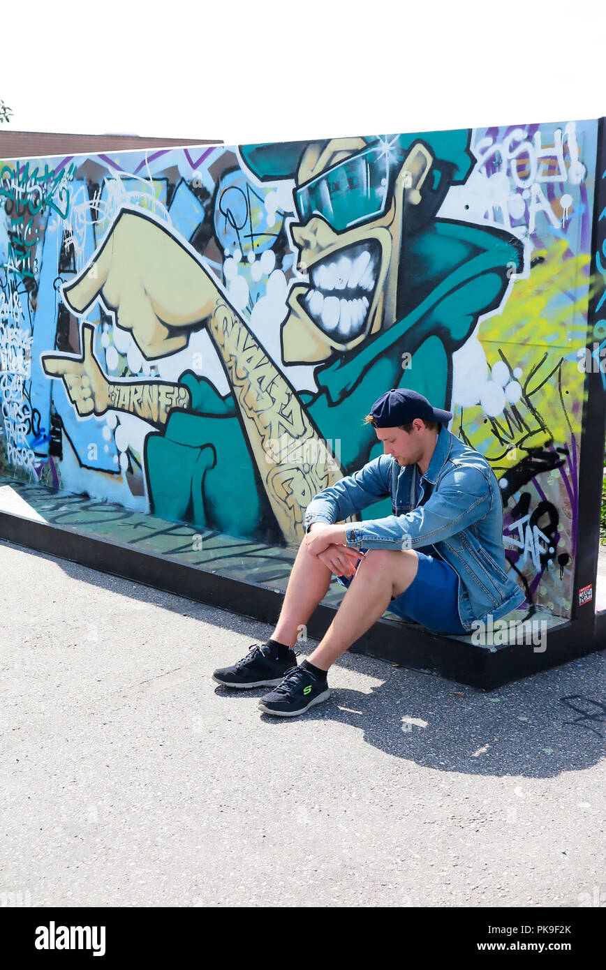 Young Man and Graffiti Wall Stock Photo - Alamy