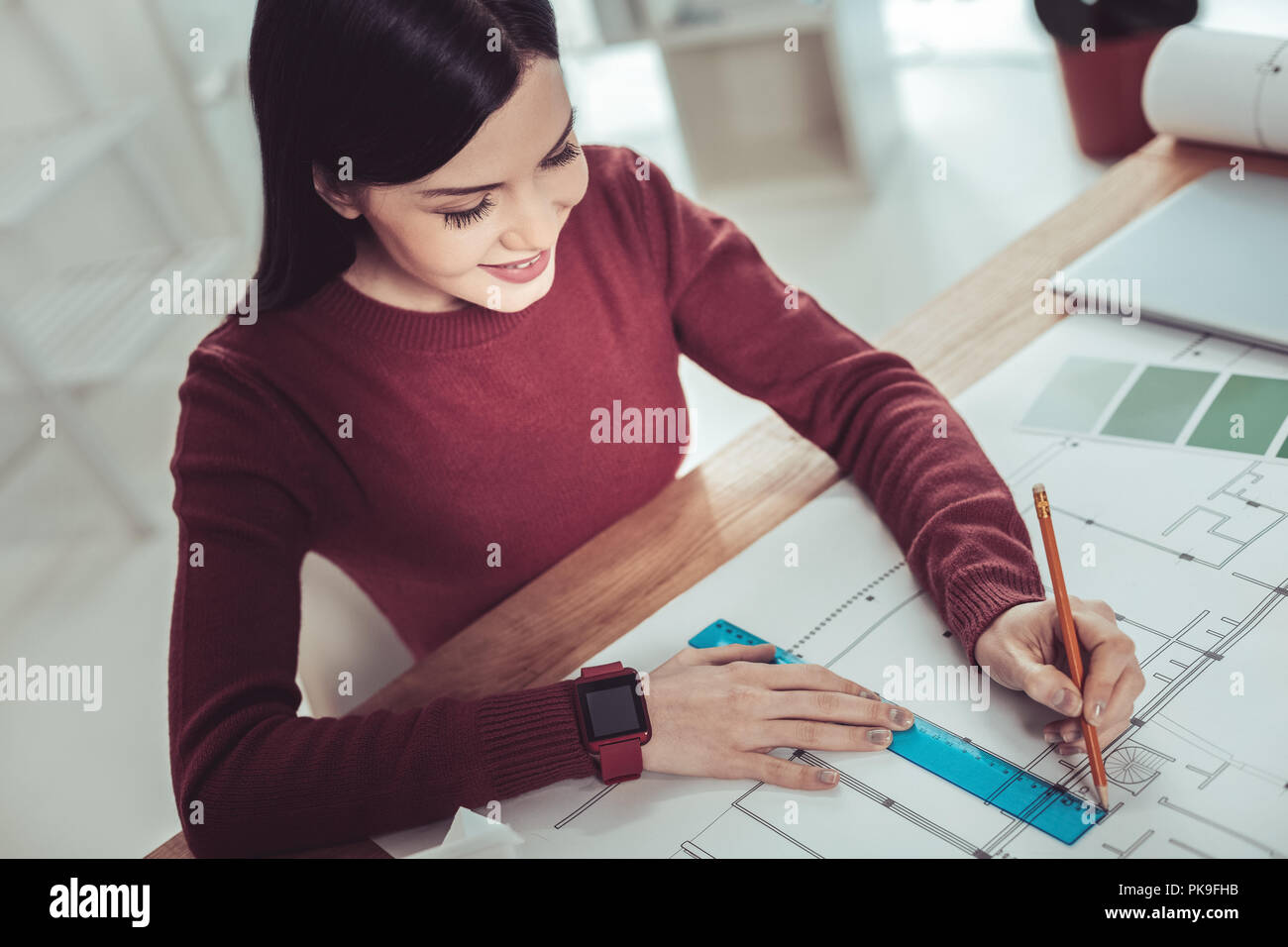 Low angle picture of delighted girl that drawing line Stock Photo - Alamy