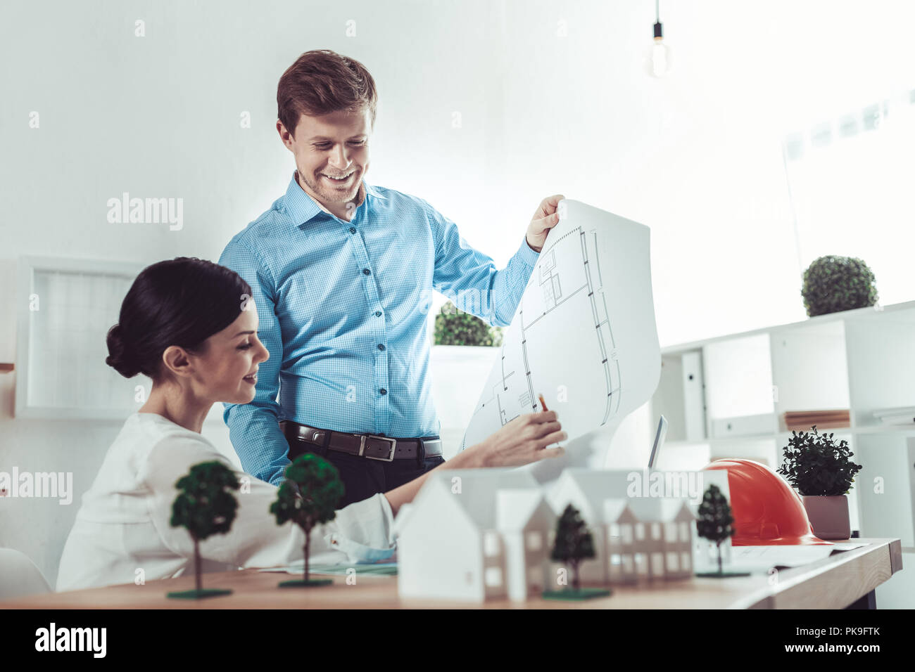 Charming girl working at her sketch Stock Photo - Alamy