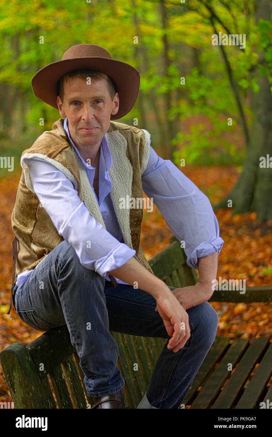 Cowboy sitting in nature hi-res stock photography and images - Alamy