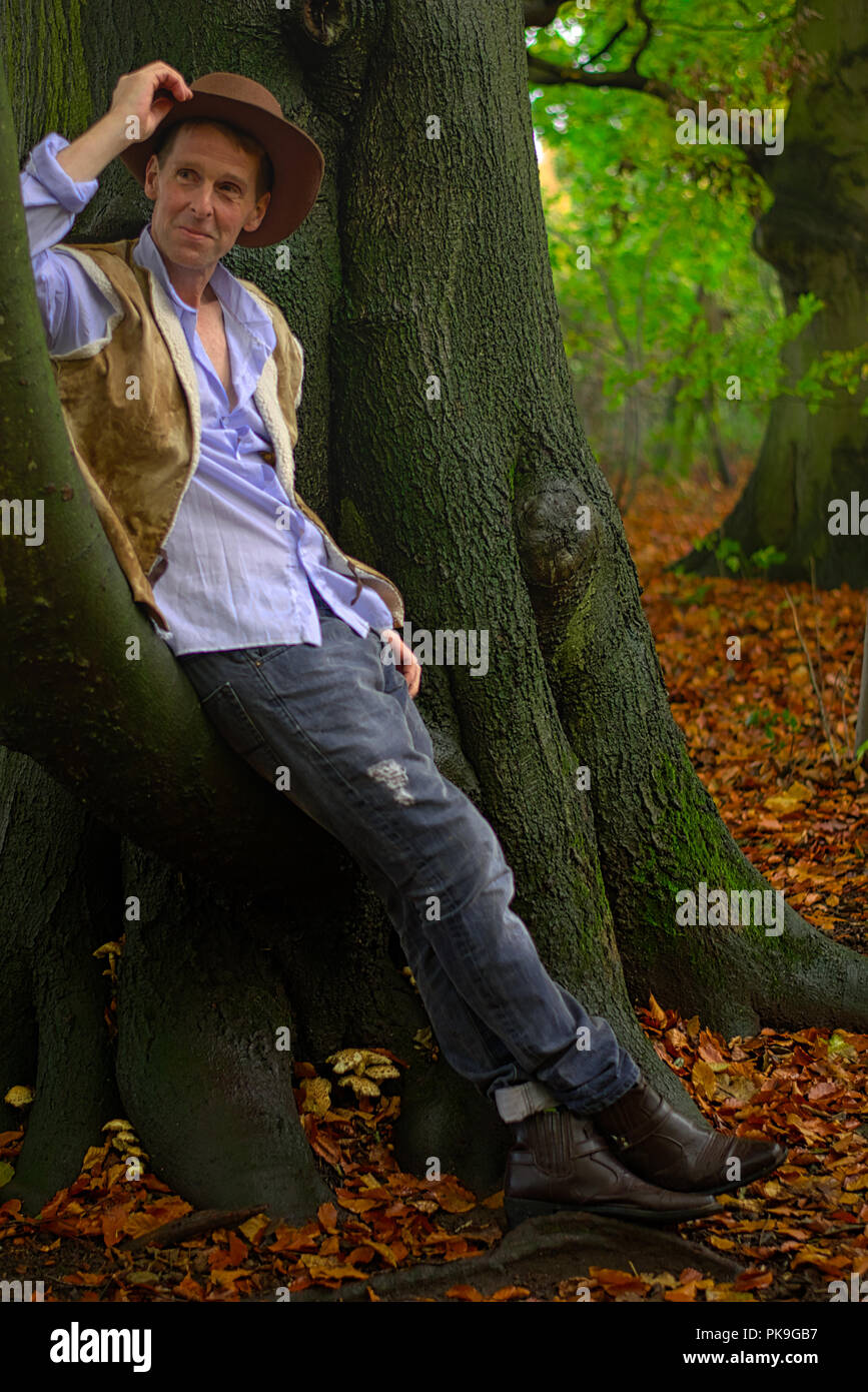 Cowboy hat and boots hi-res stock photography and images - Alamy