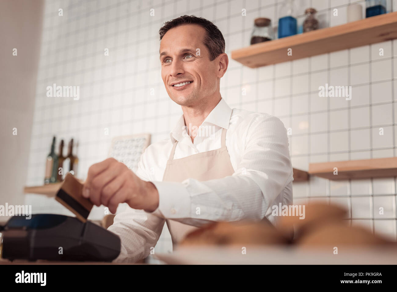 Cashier employee worker hi-res stock photography and images - Alamy