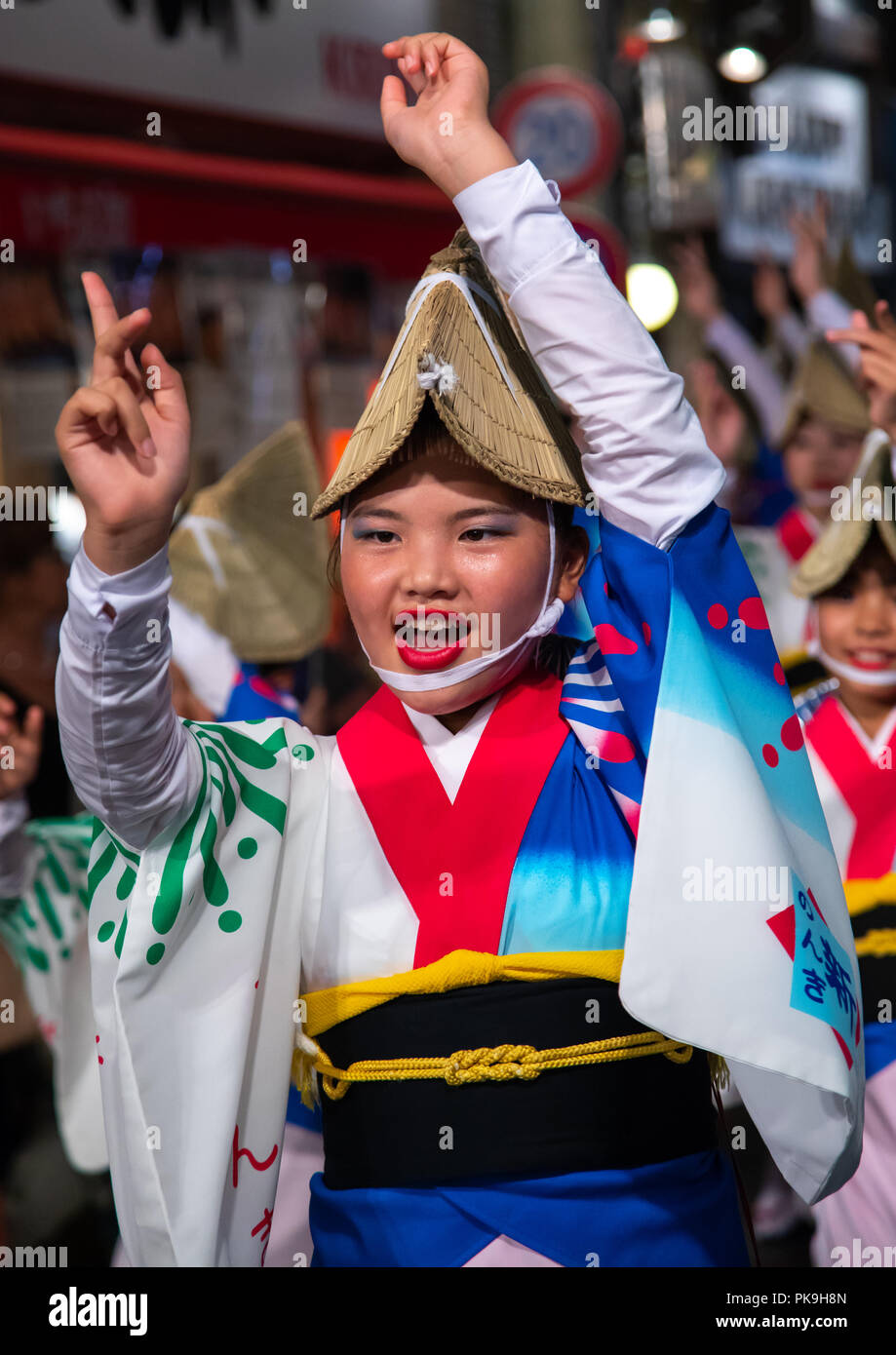 Japanese girl with straw hat during the Koenji Awaodori dance summer ...
