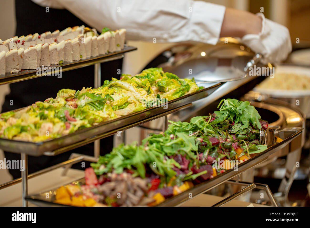 Variety of fresh salads in a buffet. buffet in the restaurant Stock ...