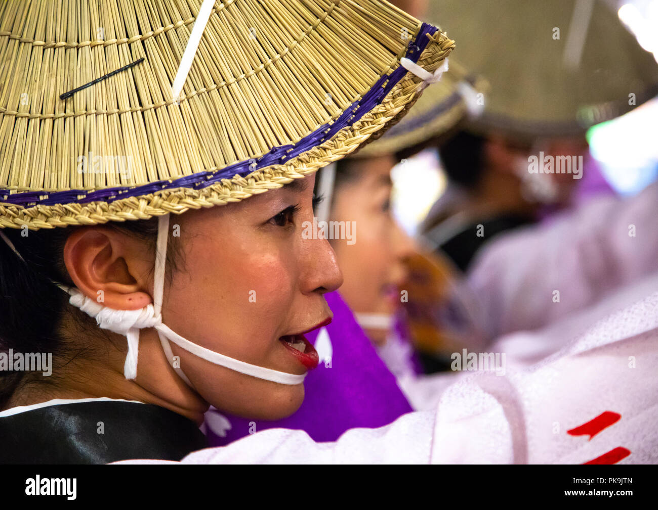 Japanese women with straw hats during the Koenji Awaodori dance summer ...