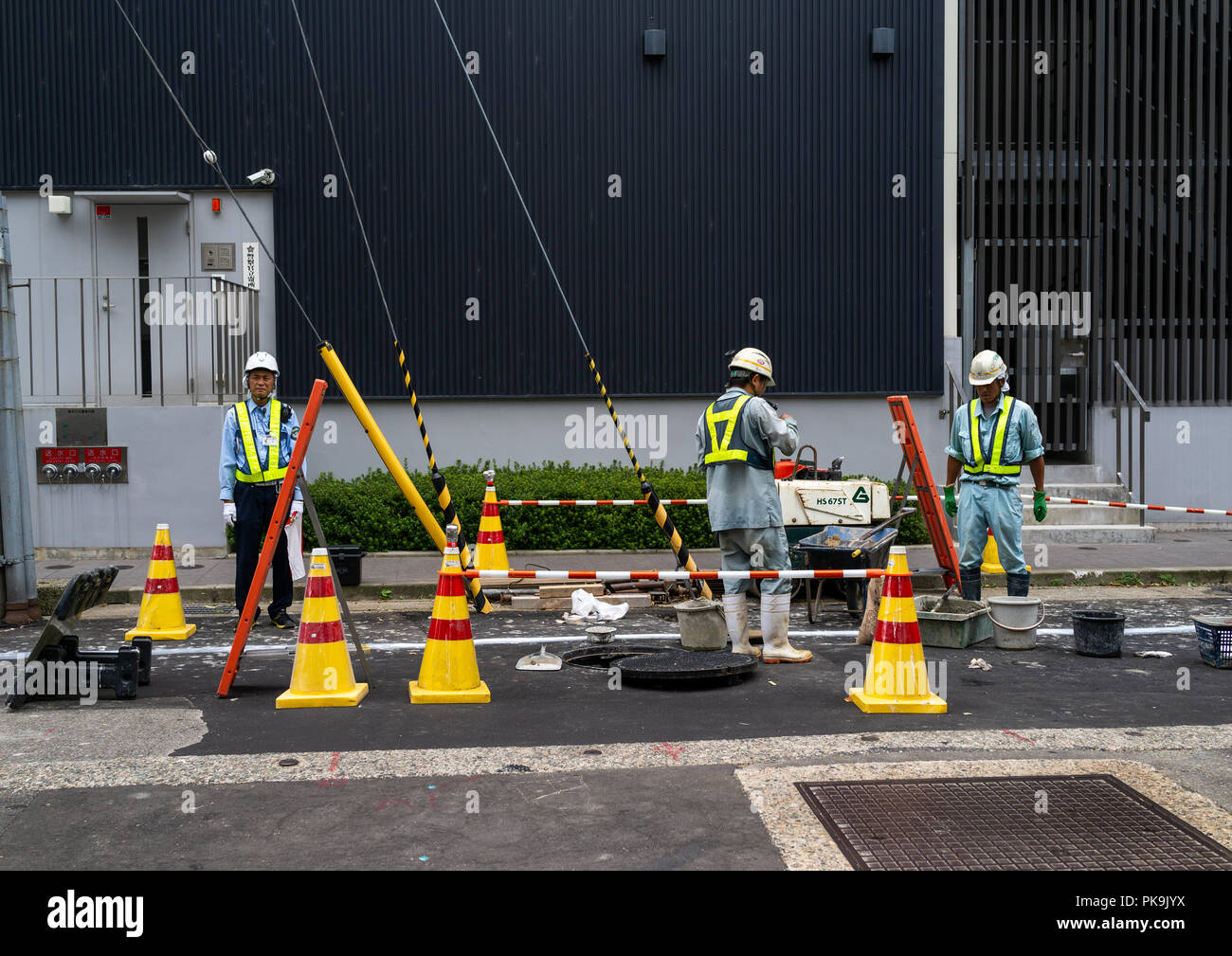 Japanese workers repairing the road, Ishikawa Prefecture, Kanazawa ...