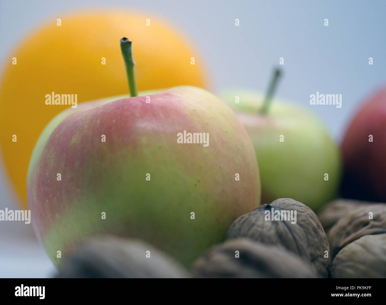 apples, orange and nuts Stock Photo - Alamy
