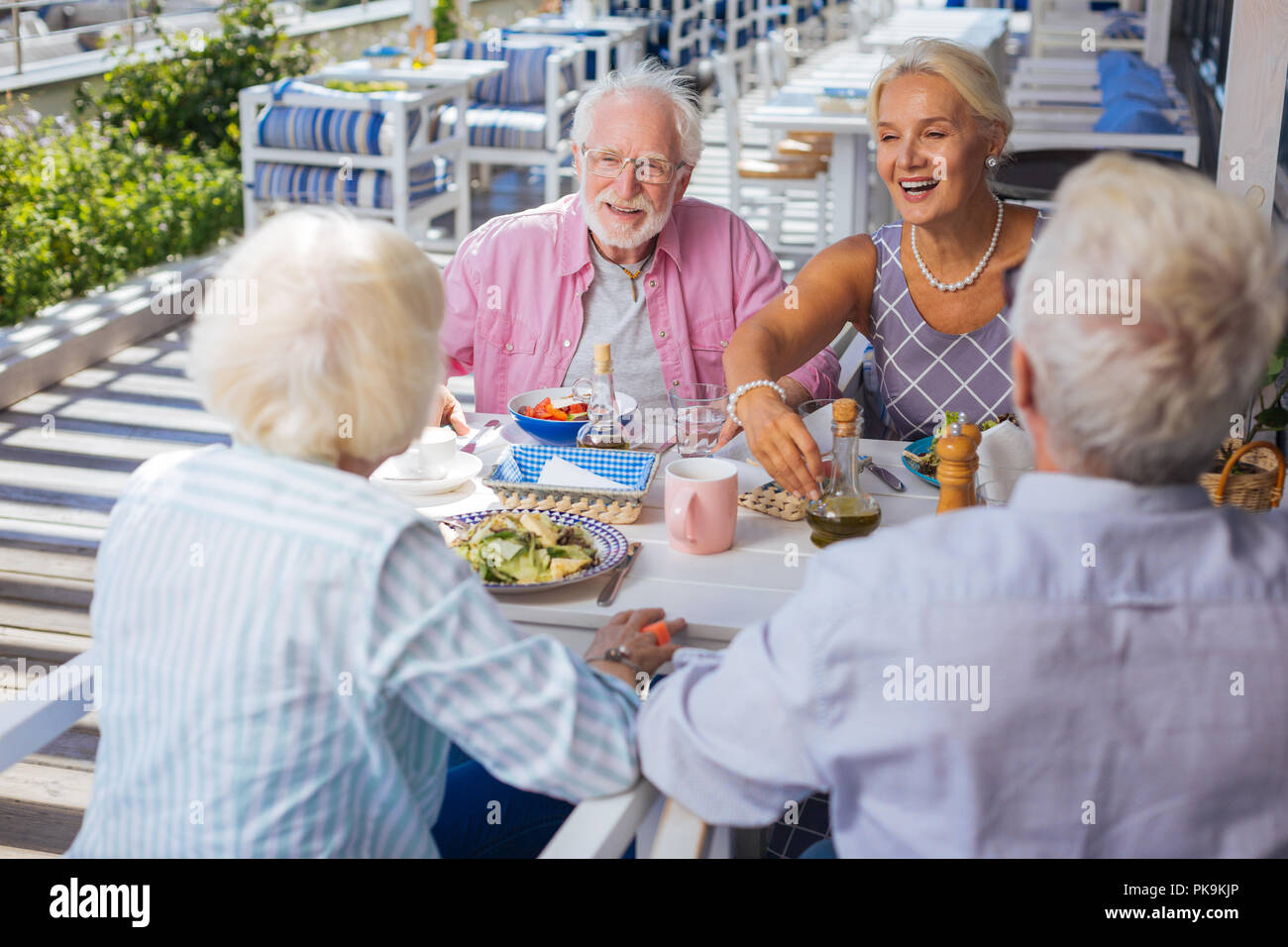 Delighted elderly people enjoying their time together Stock Photo - Alamy
