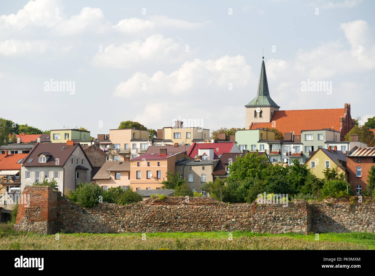 Fragments of XIV century stone walls, old town and church of St ...