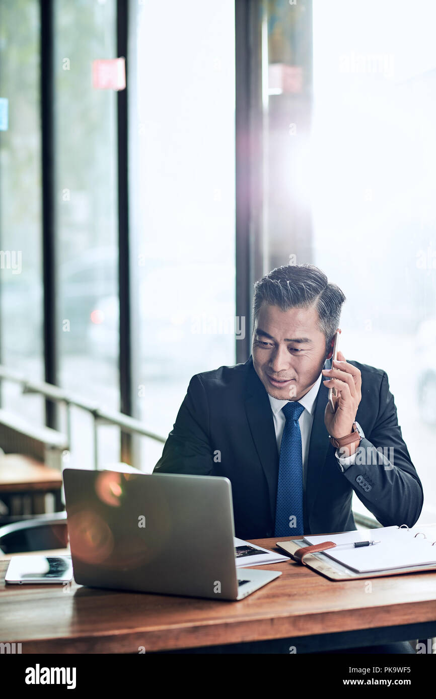 Business man make a phone call Stock Photo - Alamy