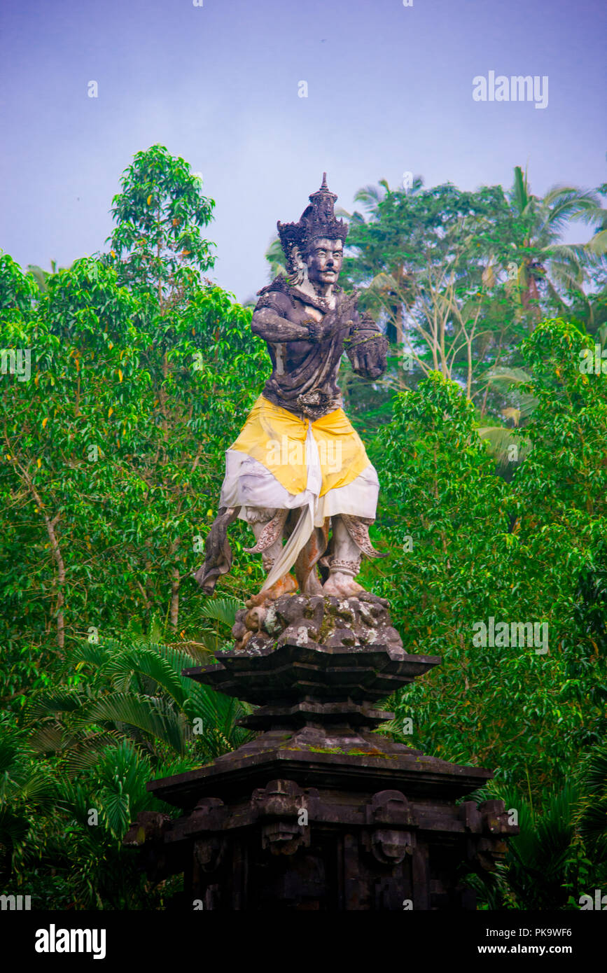 Indonesian historical statue nearby the beach of the Bali island ...