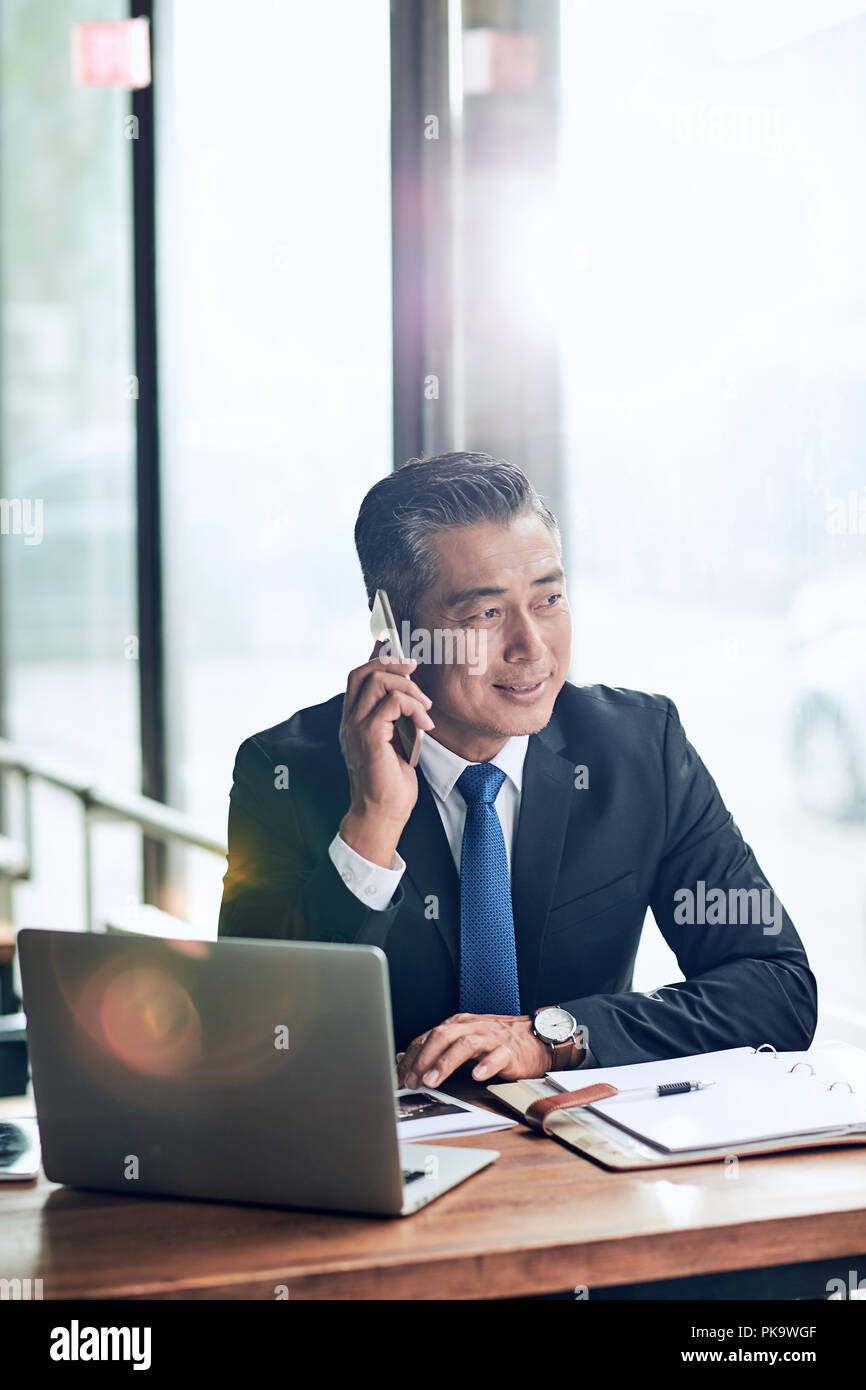 Business man make a phone call Stock Photo - Alamy