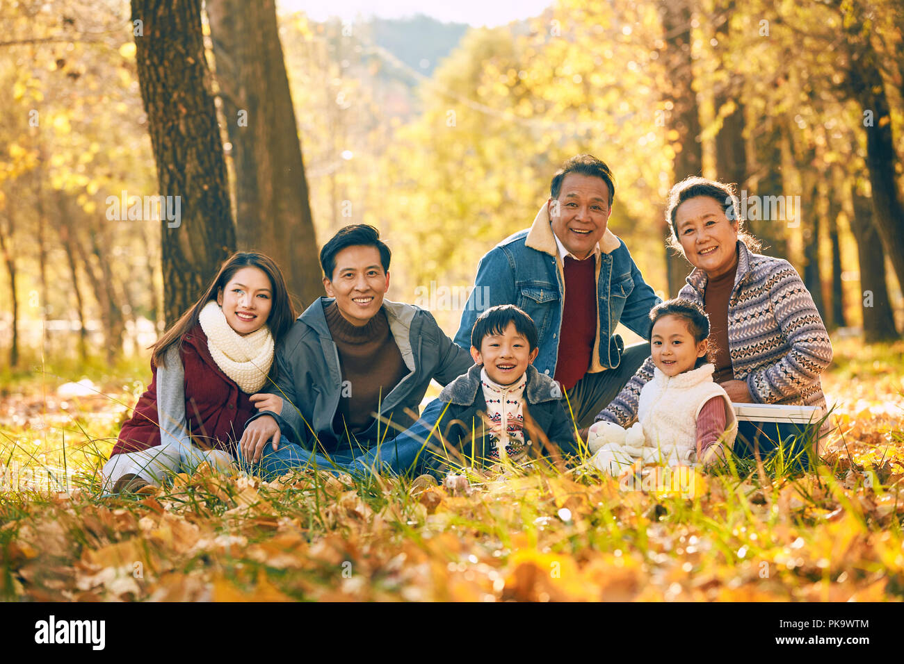 Happy family outdoor outing Stock Photo - Alamy