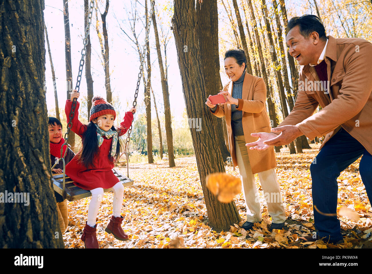 Happy family outdoor outing Stock Photo - Alamy