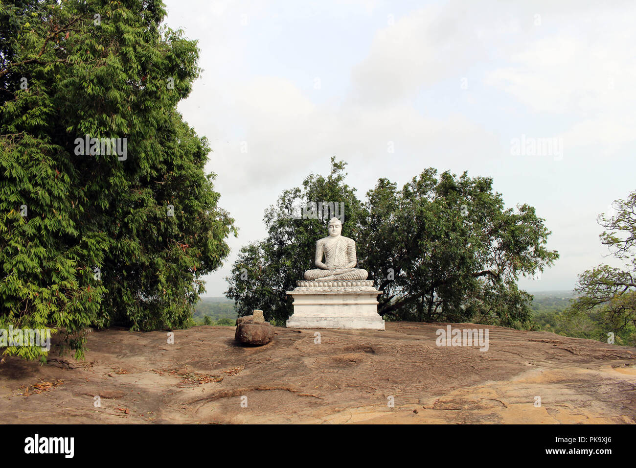 A Buddha Statue On The Way To The Top Of Pidurangala Rock To See