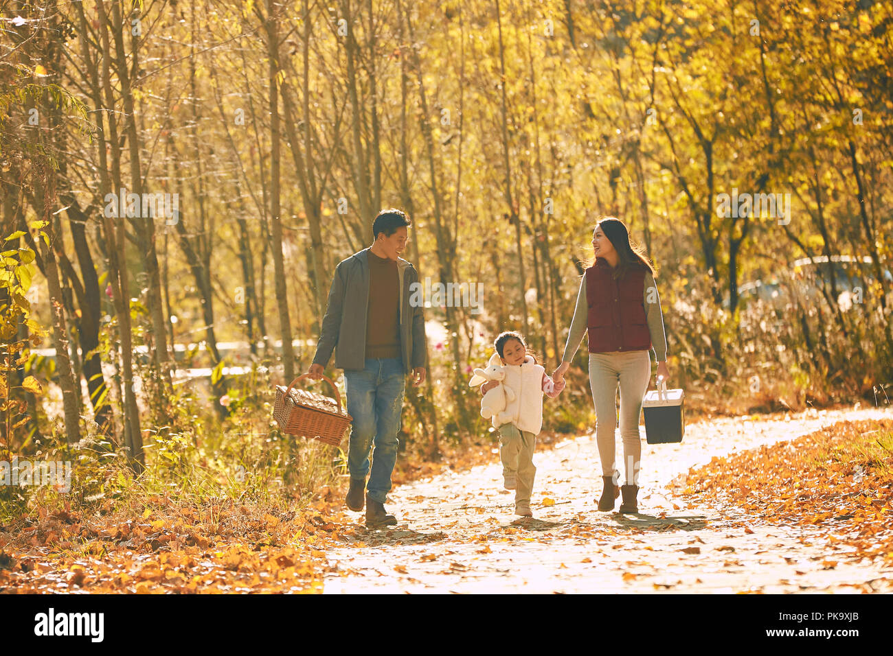 Happy family in the outdoor outing Stock Photo - Alamy