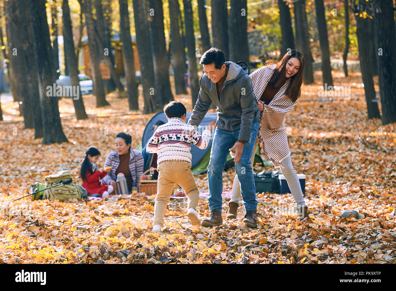 Happy family outdoor outing Stock Photo - Alamy