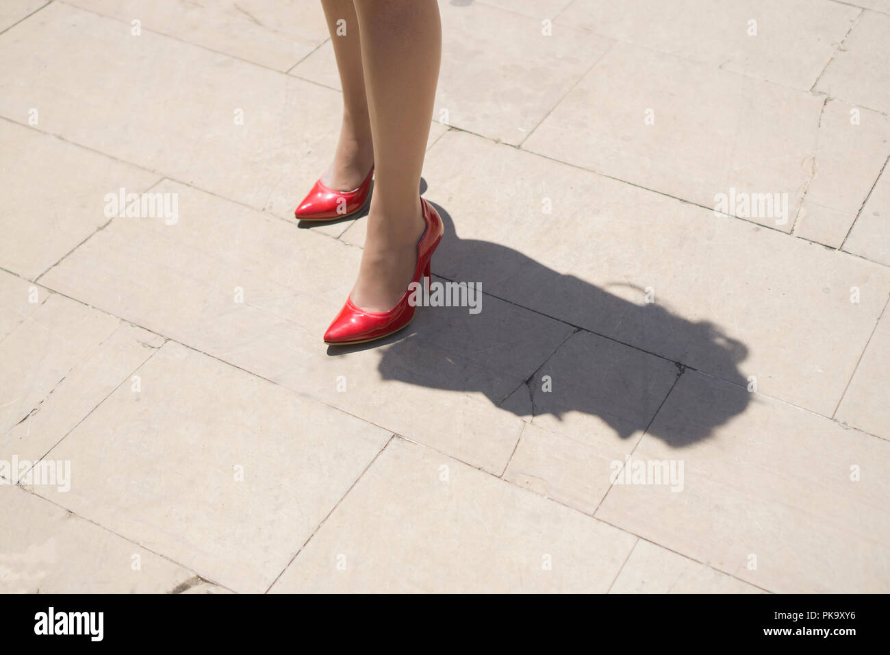 Red heels hi-res stock photography and images - Alamy