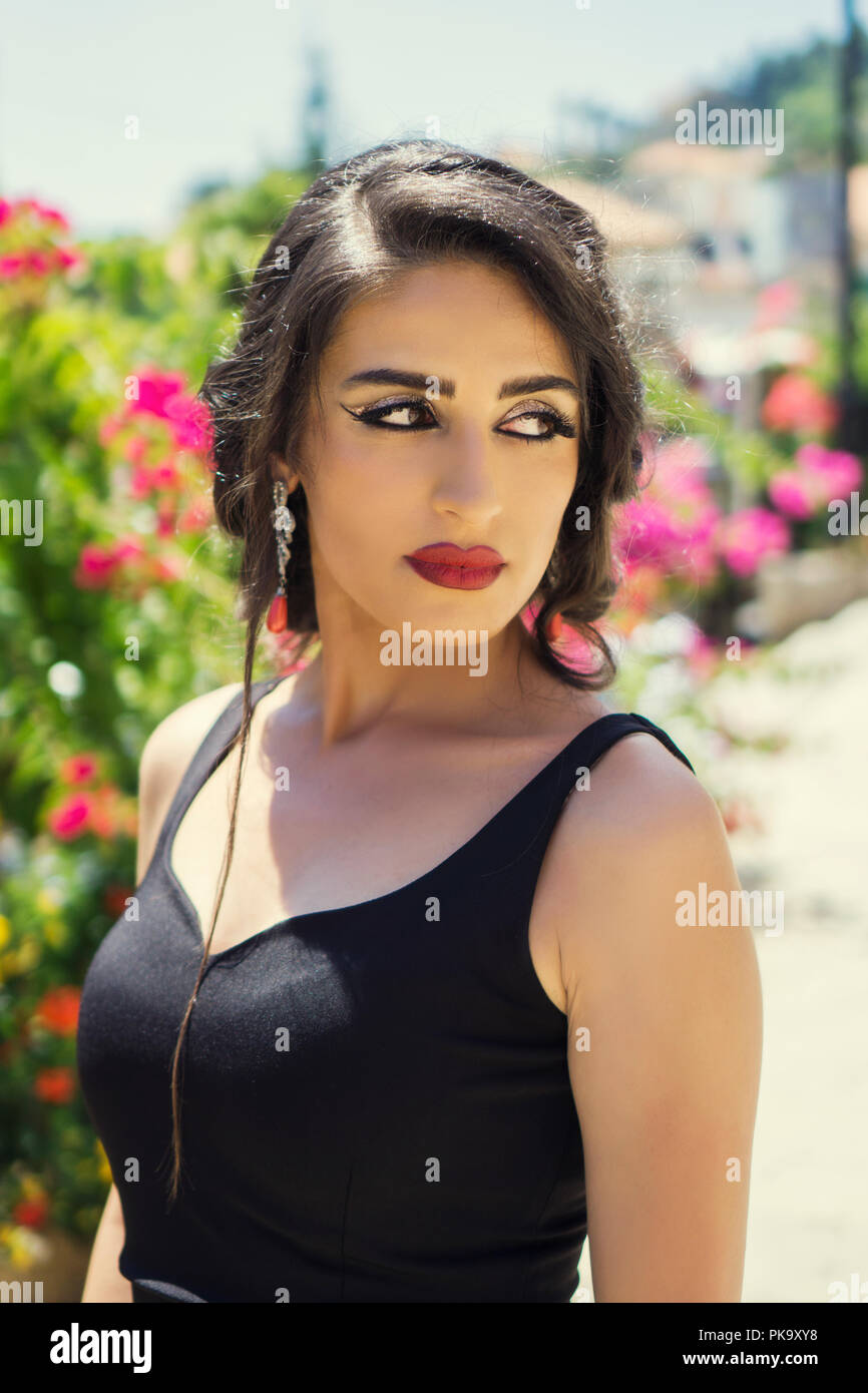 Dark hair serious portrait woman hi-res stock photography and images ...