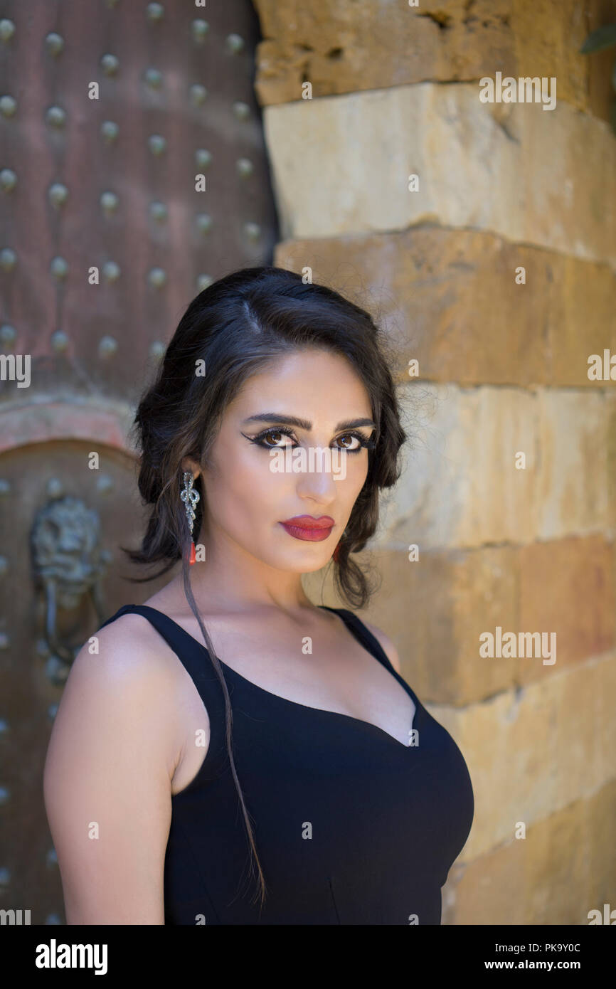 Beautiful woman staring outdoors Stock Photo - Alamy