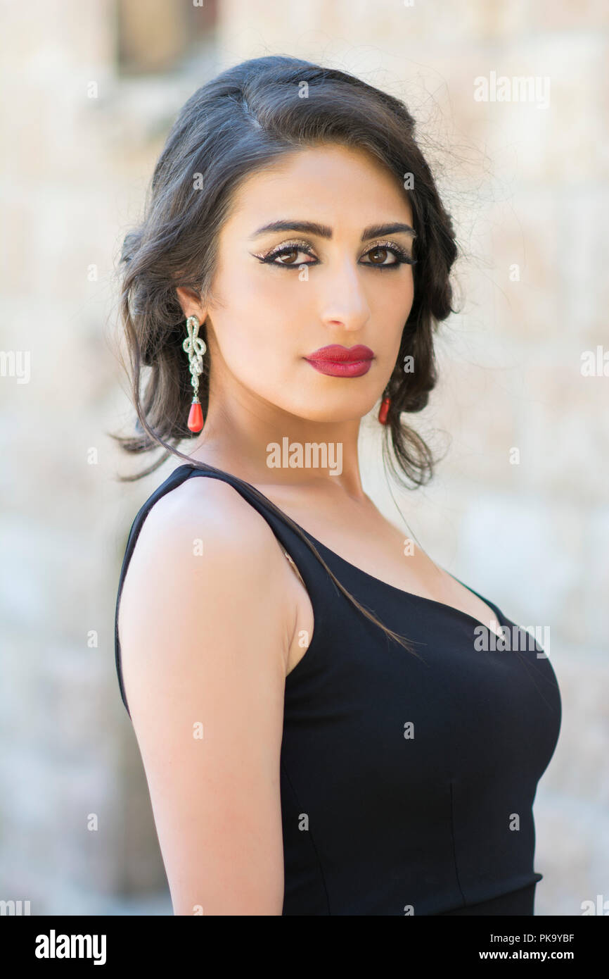 Beautiful woman standing hi-res stock photography and images - Alamy