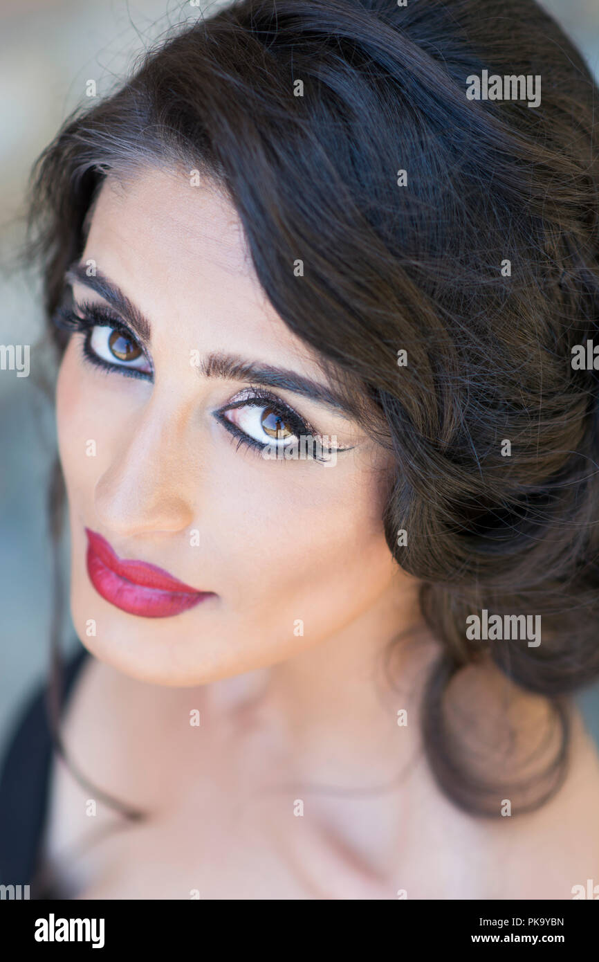 High angle portrait of a beautiful woman looking up Stock Photo - Alamy