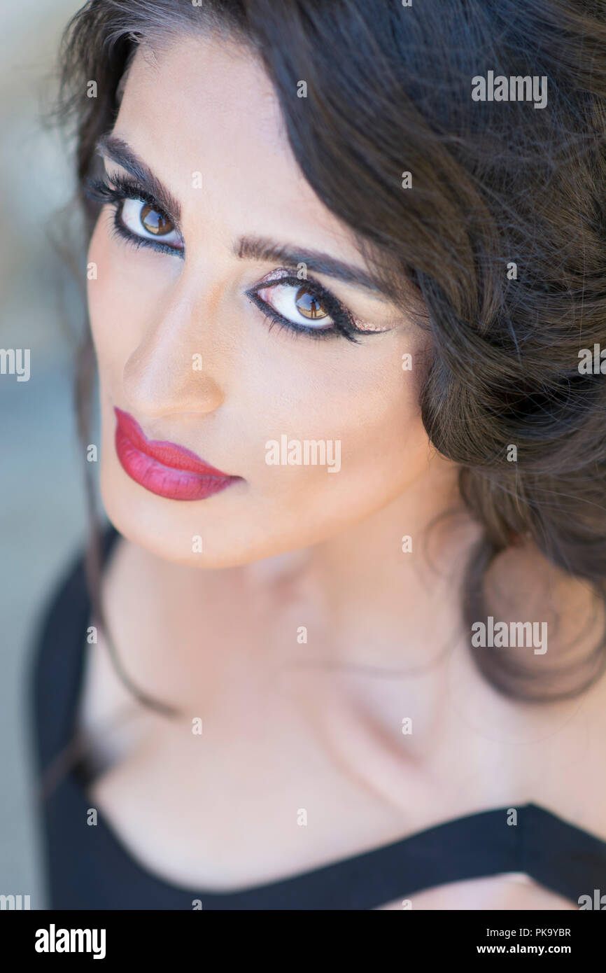 High angle portrait of a beautiful woman looking up Stock Photo - Alamy