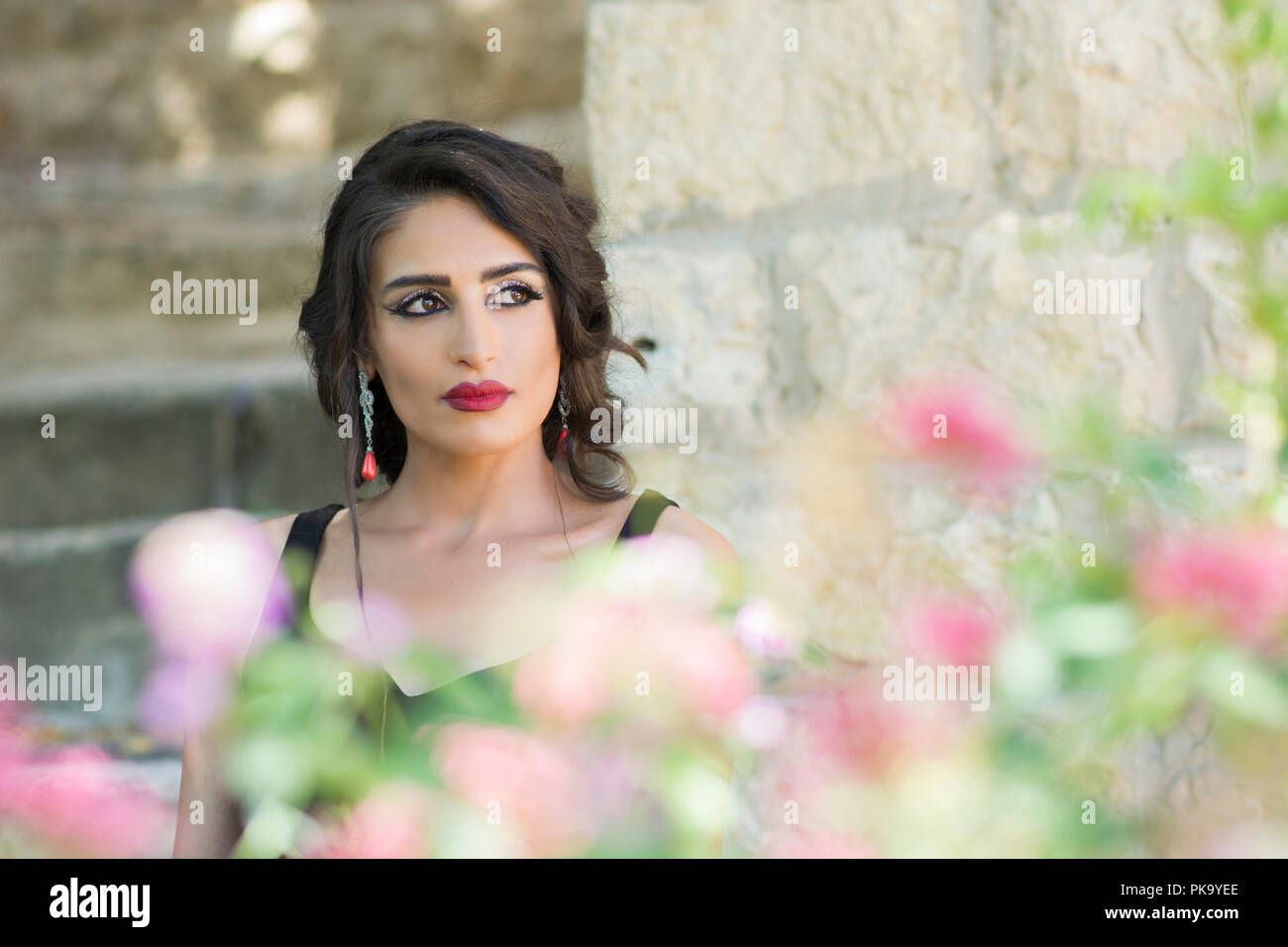 Beautiful woman in the garden Stock Photo - Alamy