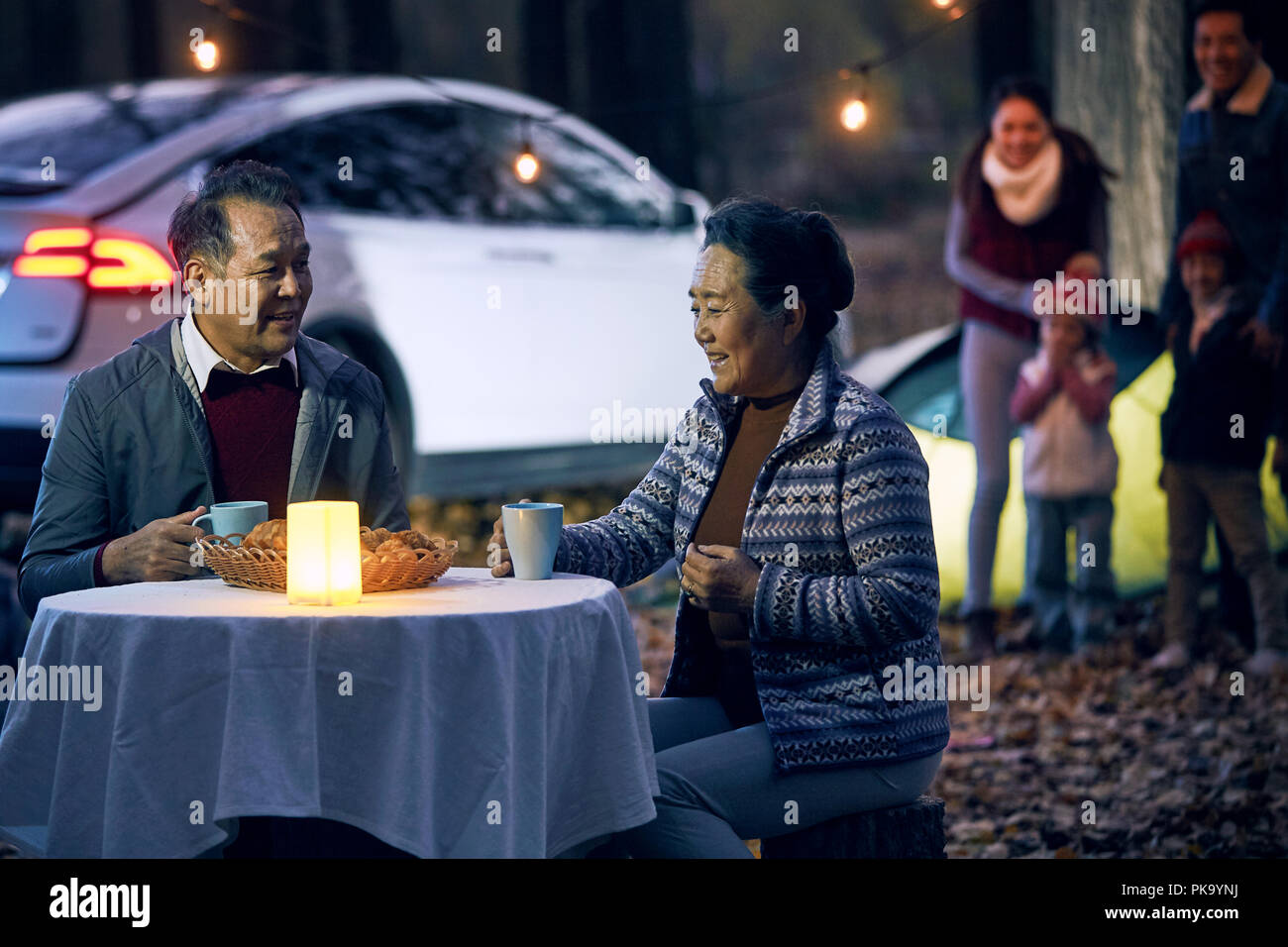 Happy family outdoor outing Stock Photo - Alamy