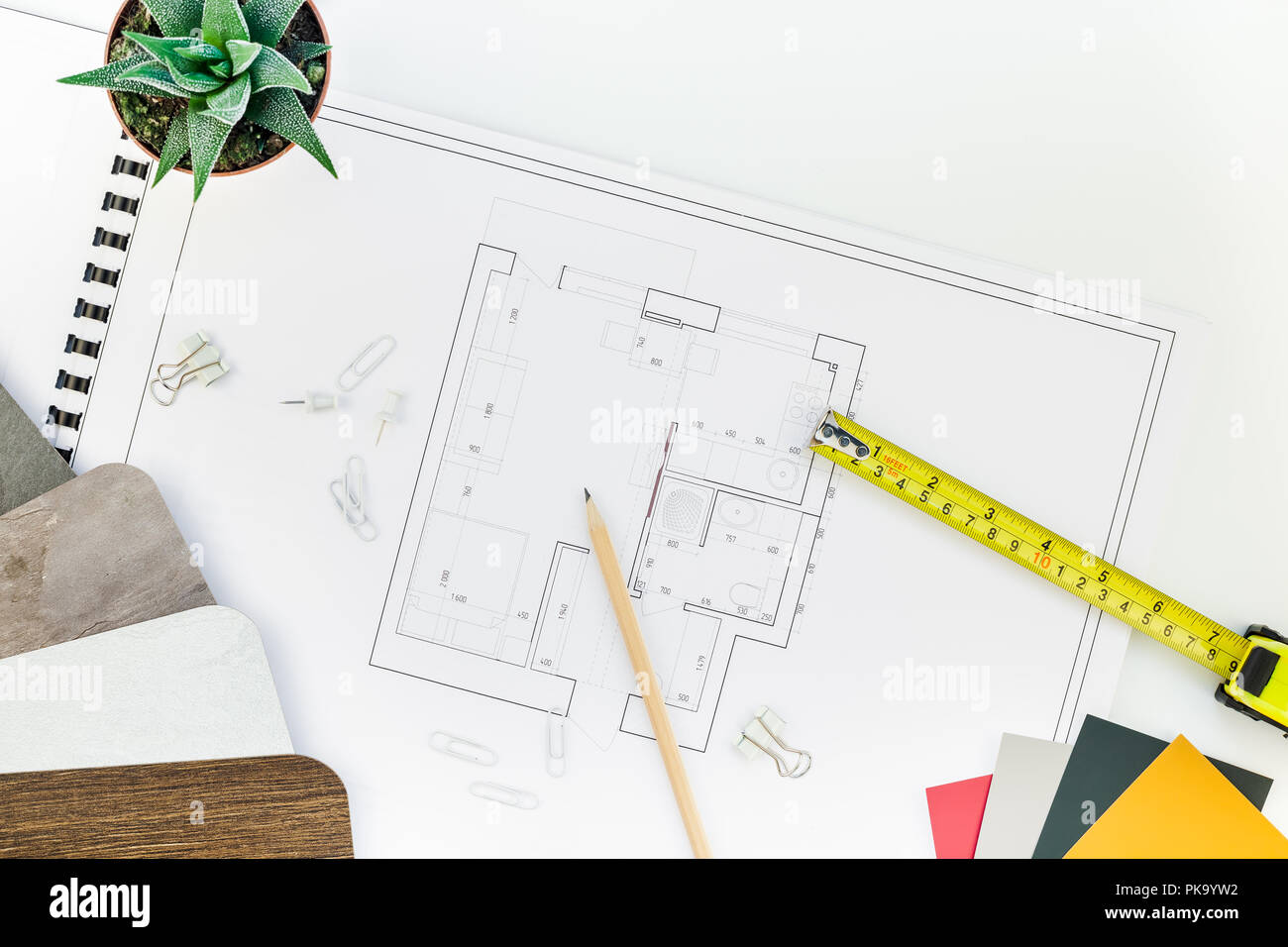 Creative flat lay overhead top view blueprints architectural flat ...