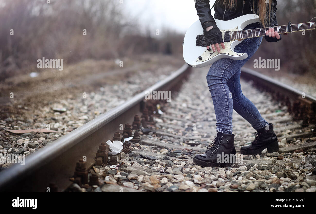 Beautiful young girl rocker with electric guitar. A rock musicia Stock ...