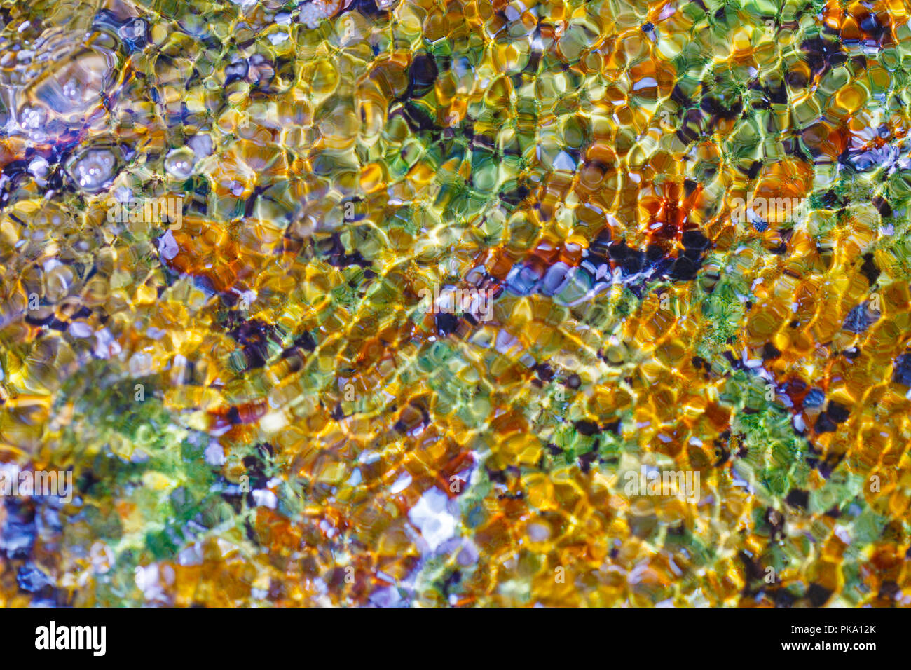 Colorful stones and rocks along the beach Stock Photo - Alamy