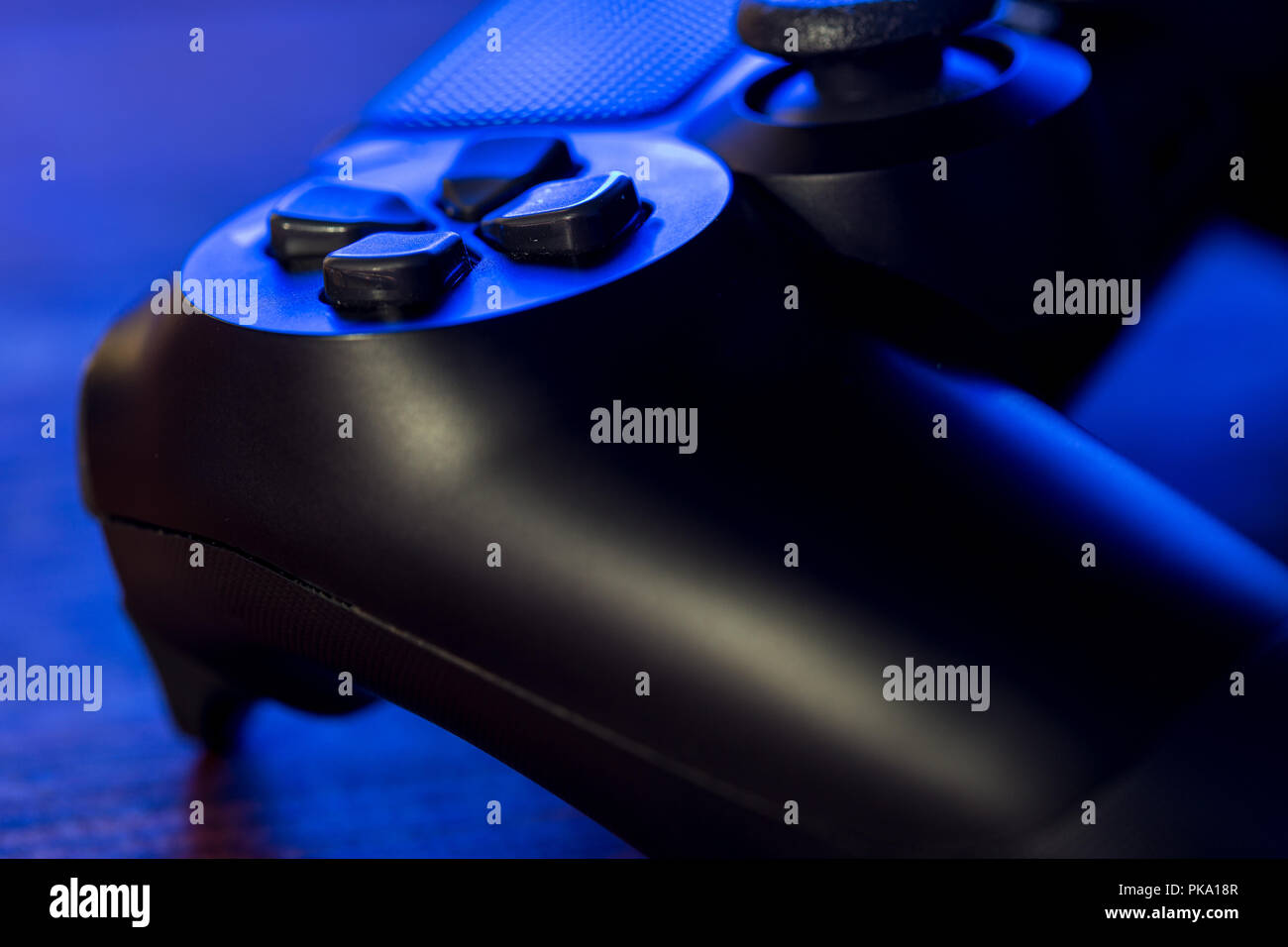 Video game controller at night with lights Stock Photo - Alamy