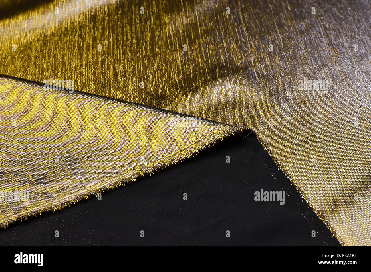 Fabric of golden color Stock Photo - Alamy