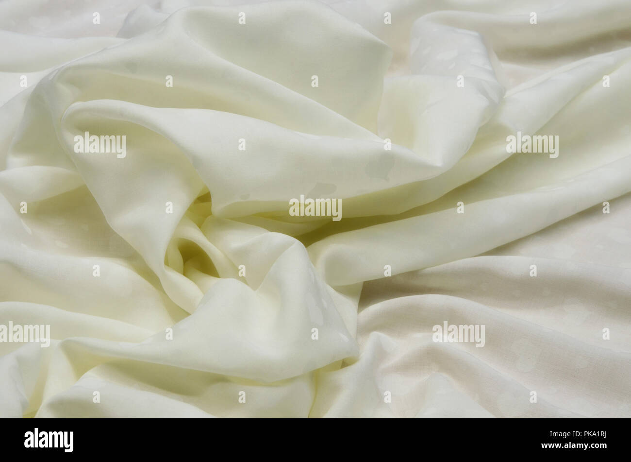 Cotton fabric with viscose milk color Stock Photo - Alamy