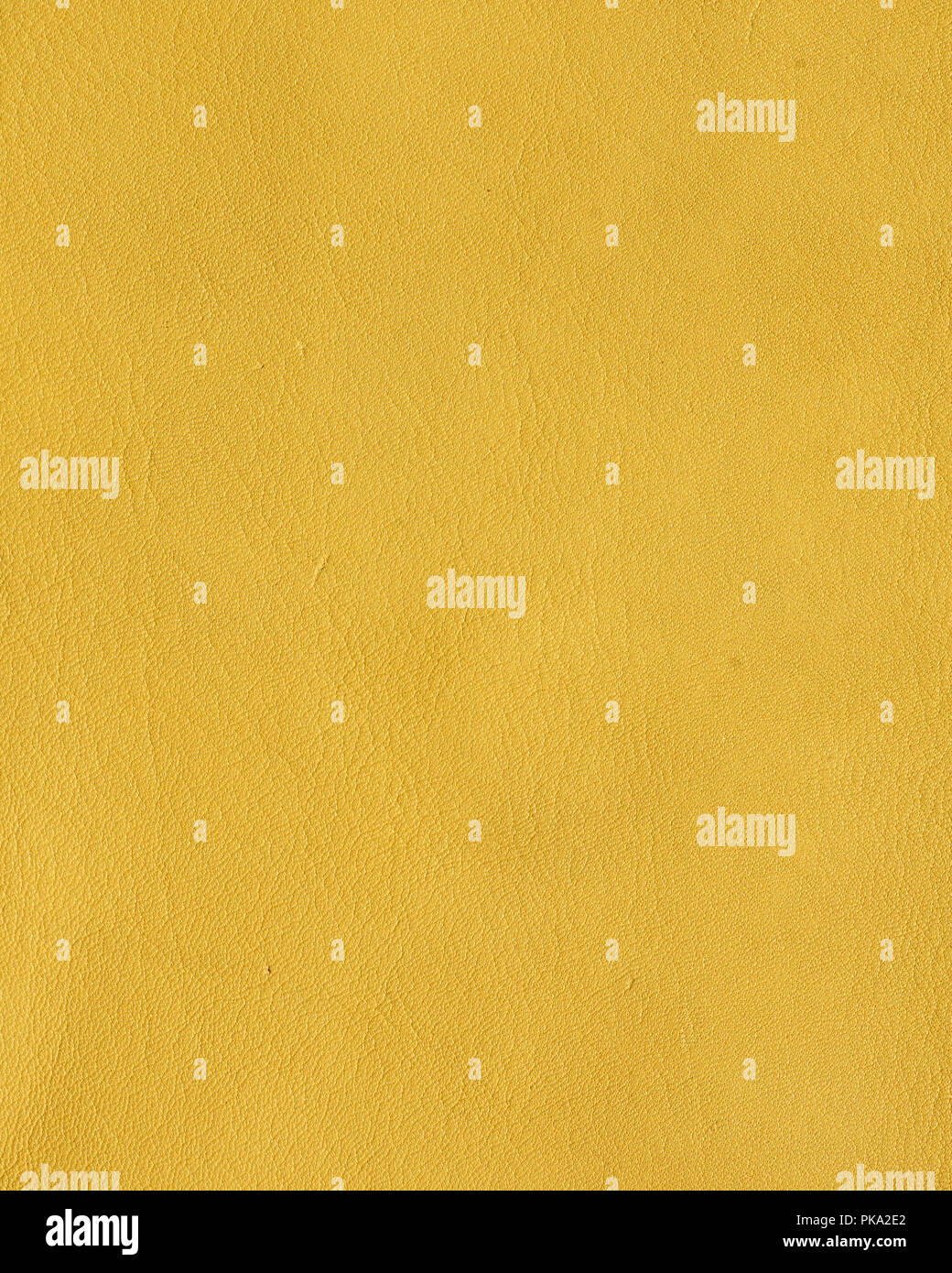 Ocher yellow leather texture background Stock Photo - Alamy