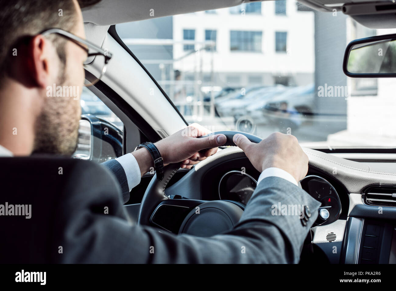 selective focus of businessman driving car alone Stock Photo - Alamy