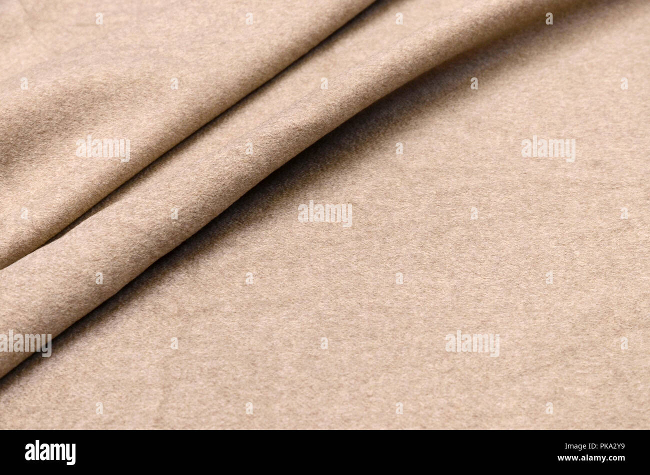 Cashmere for a coat of light brown color Stock Photo - Alamy