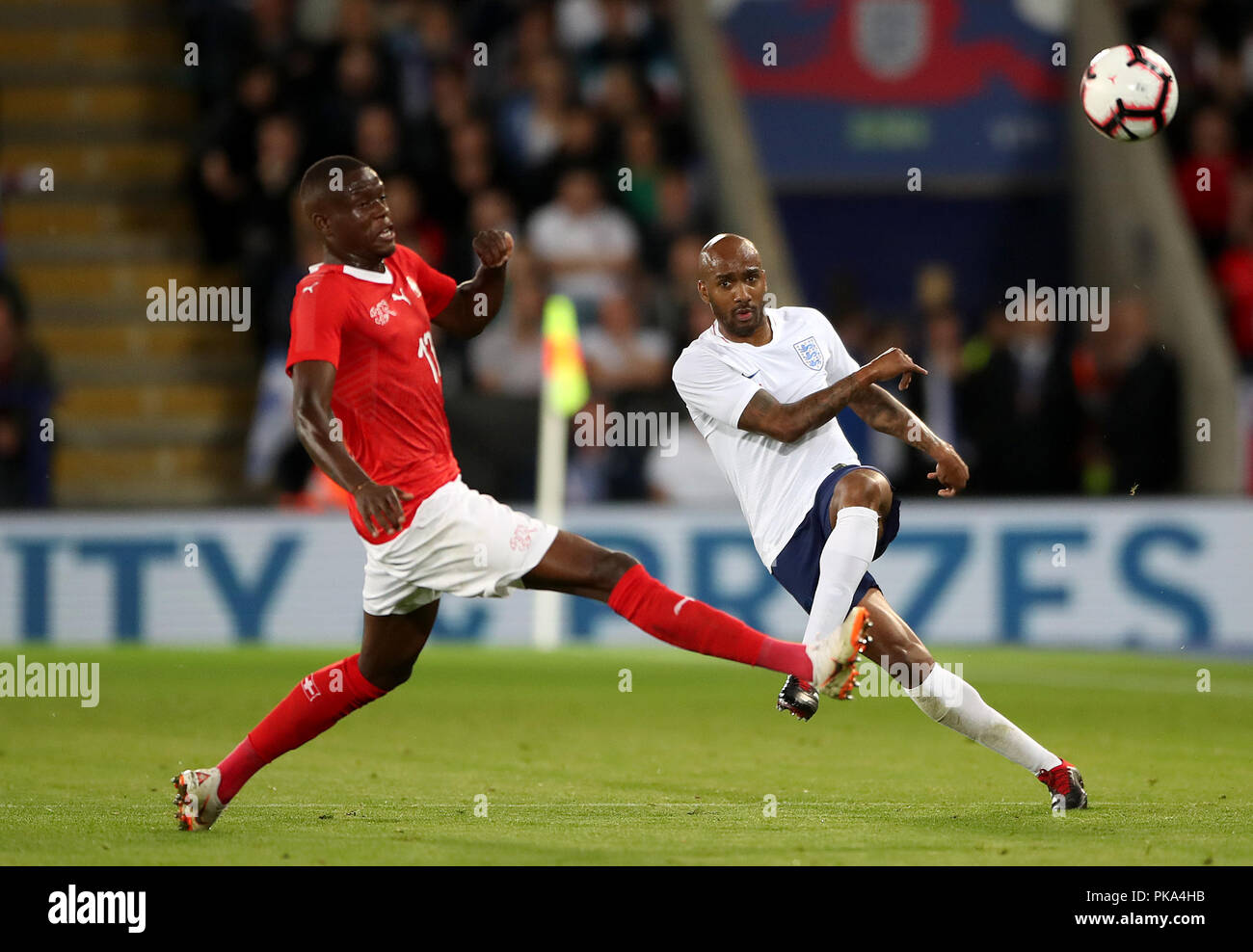 England's Fabian Delph (right) and Switzerland's Denis Zakaria in ...