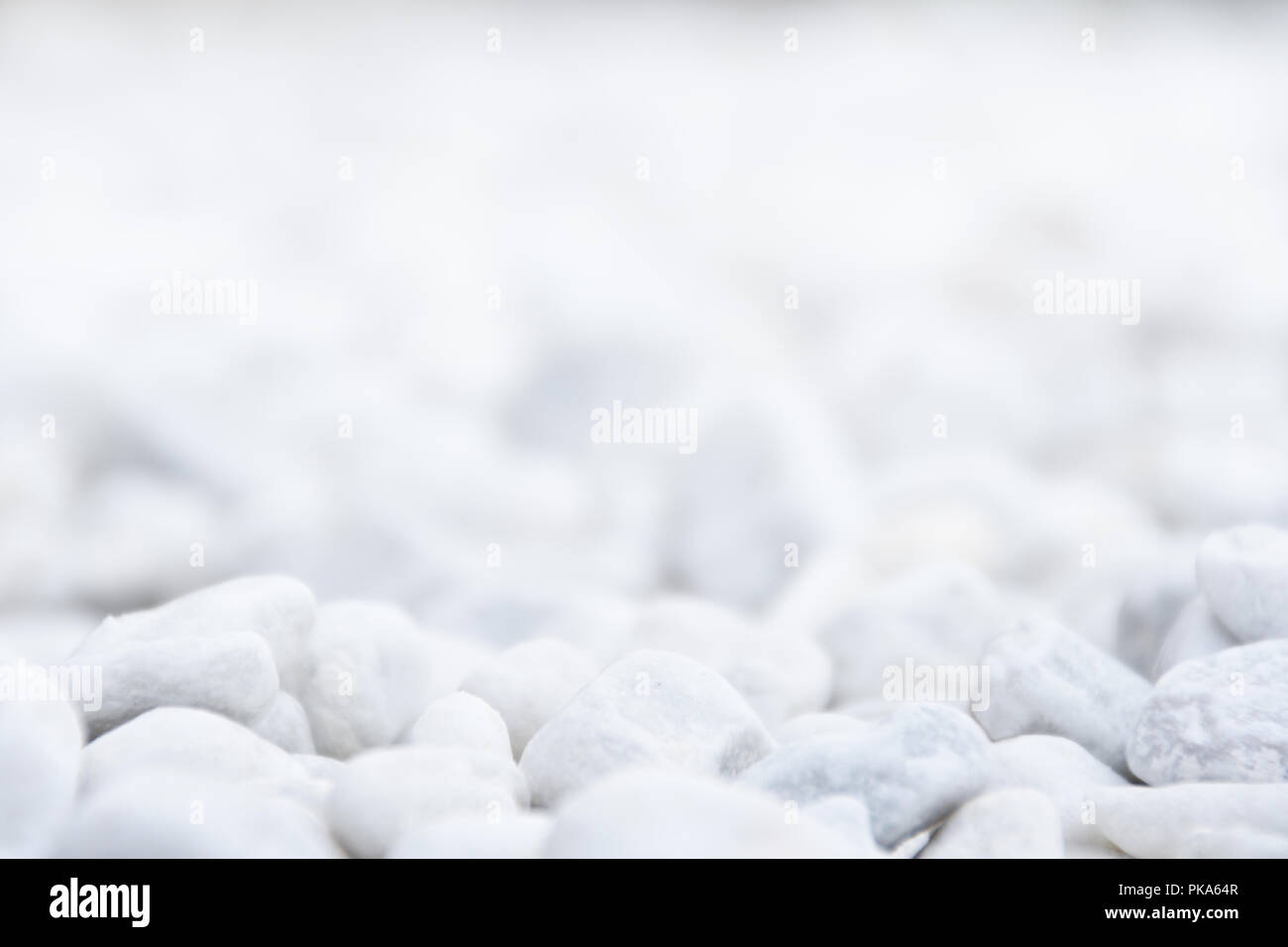 White background gravel stones, rock Stock Photo - Alamy