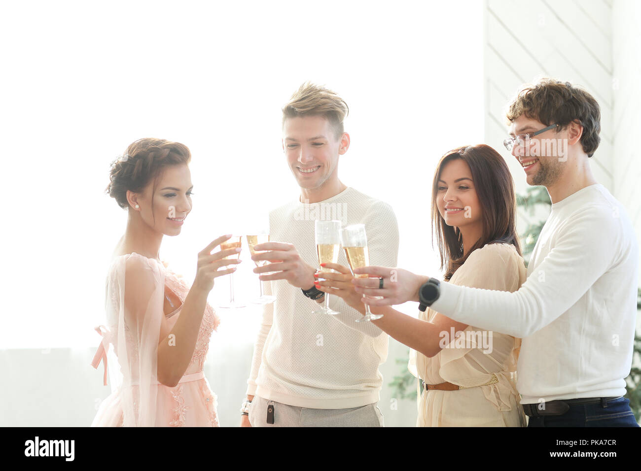 Champagne toast. People holding glass of champagne Stock Photo - Alamy
