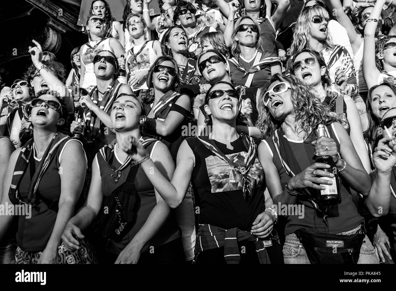 Female Members Of The Pantera (Panther) Contrada Singing In The Piazza ...